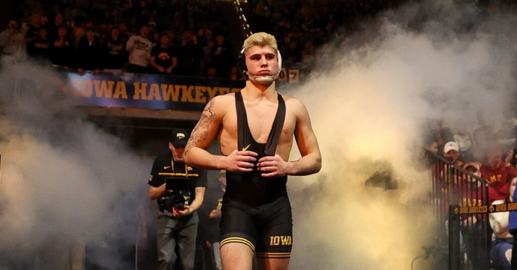 Iowa Wrestling Angelo Ferrari Makes Parents AJ And Adriana Proud With ...